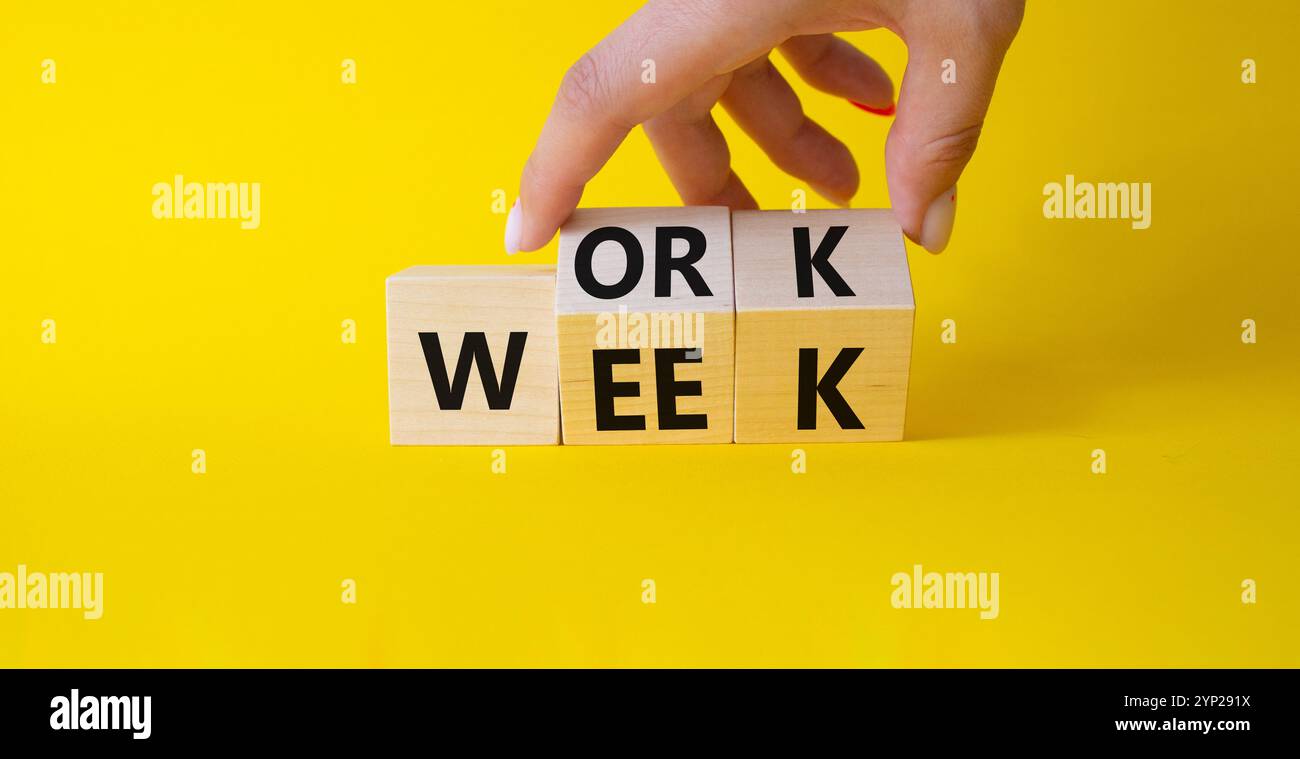 Work Week symbol. Businessman hand Turns cubes with words Work Week ...