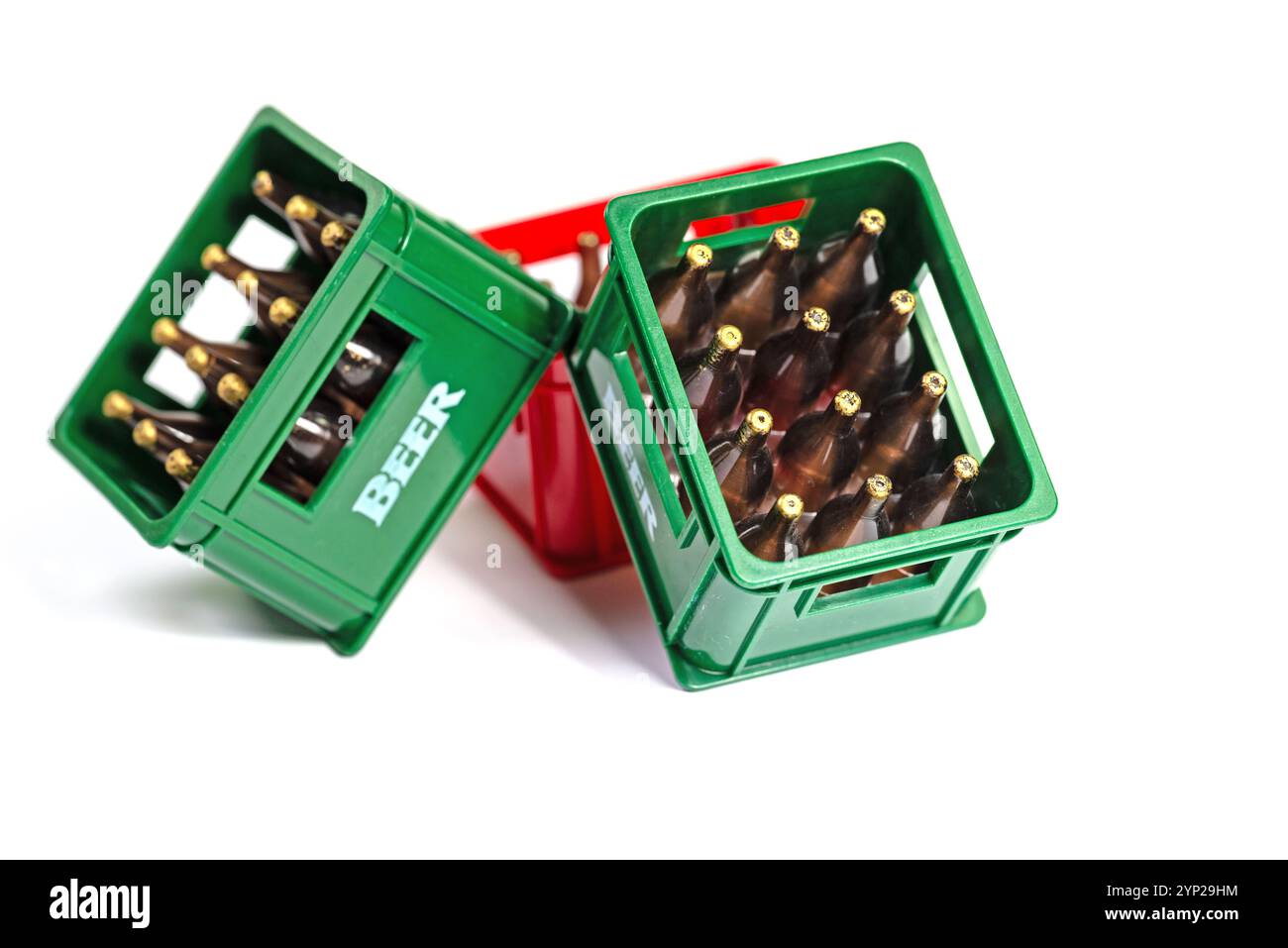 Three beer crates in front of a white background Stock Photo - Alamy