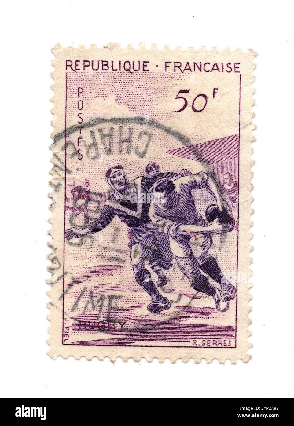 A vintage rugby postage stamp from France isolated on a white ...