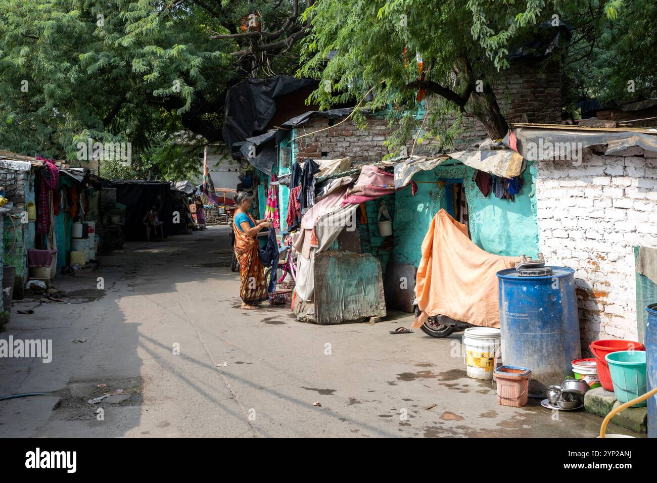 NEW DELHI - SEPT 18: Traditional small slums with daily routine in ...