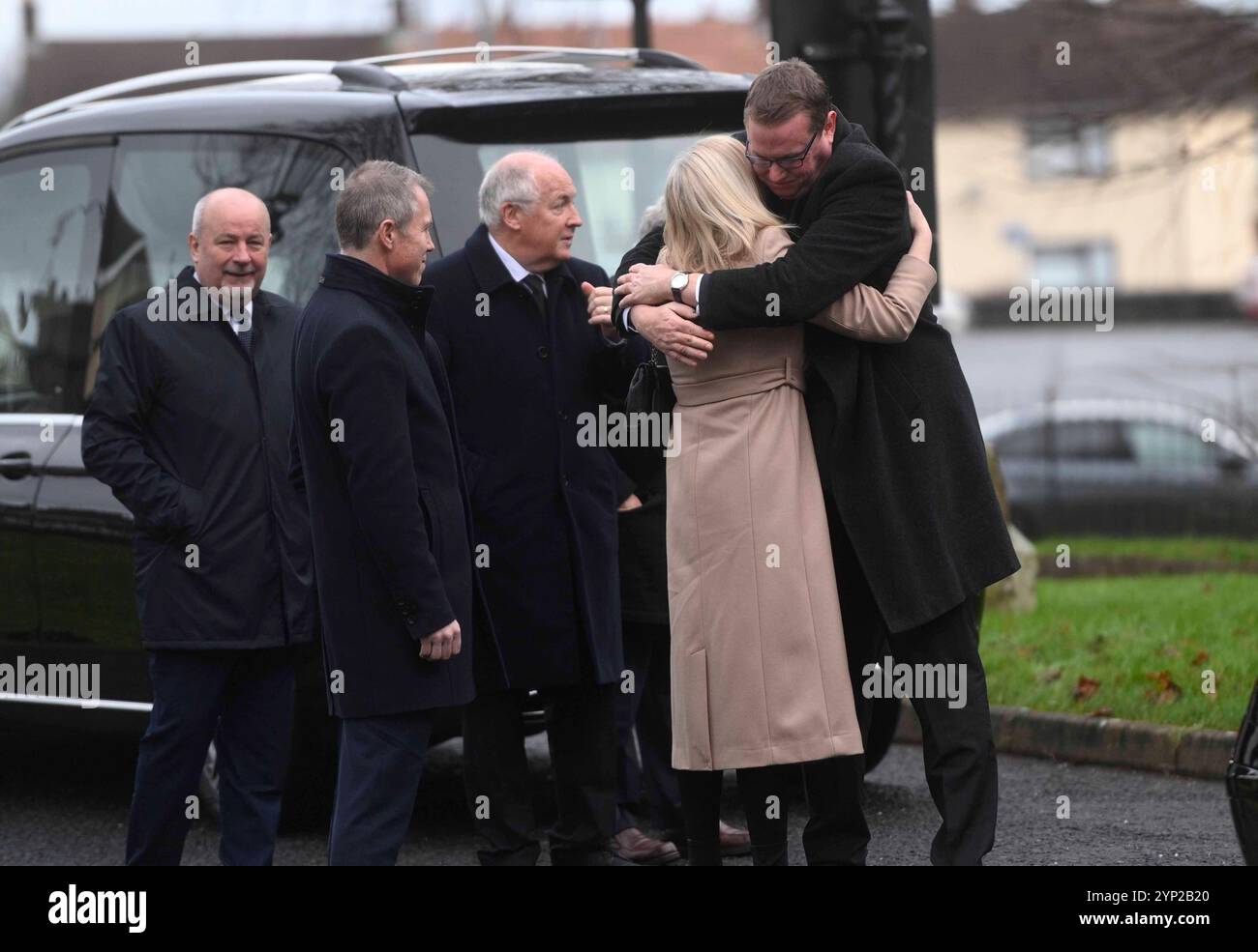 Gareth Reid (right) attends the funeral of his father, veteran ...