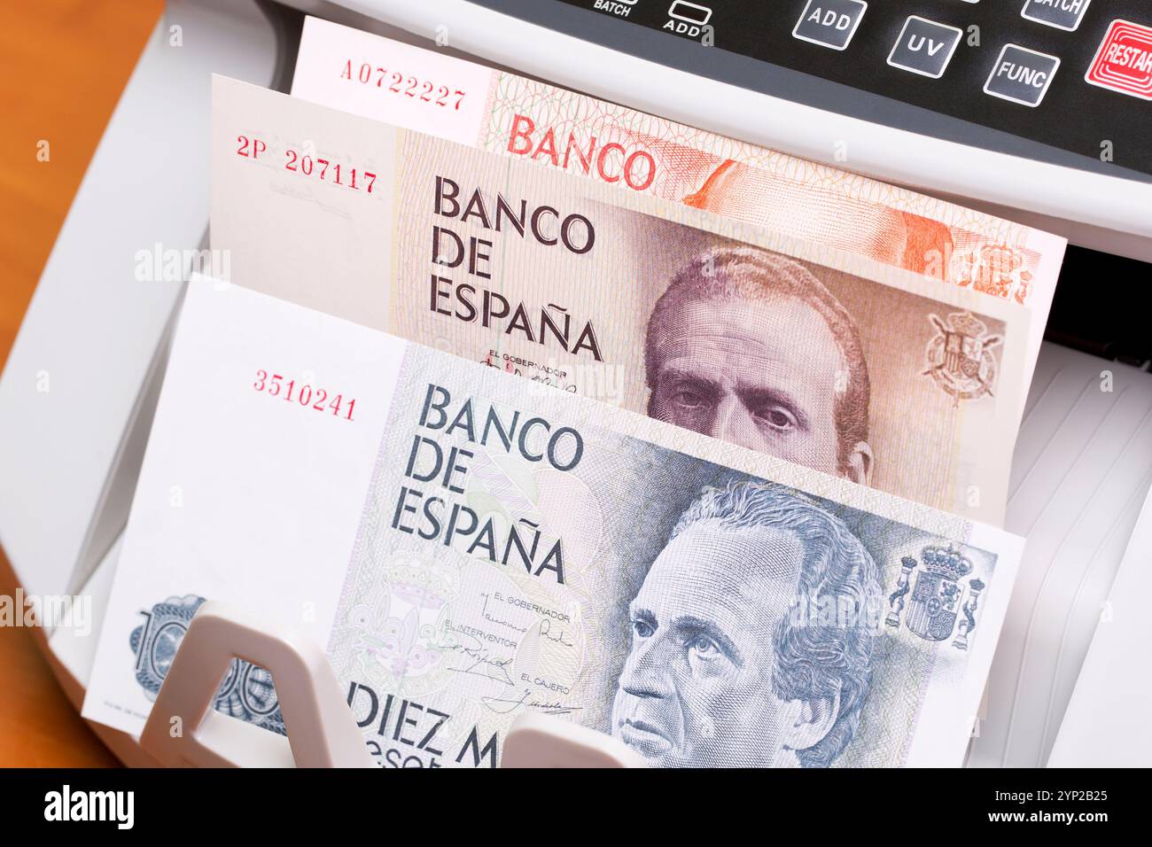 Spanish money - peseta in the counting machine Stock Photo - Alamy