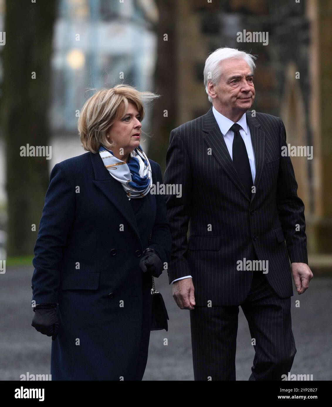 Rose Neil and Paul Clarke attend the funeral of veteran journalist and ...