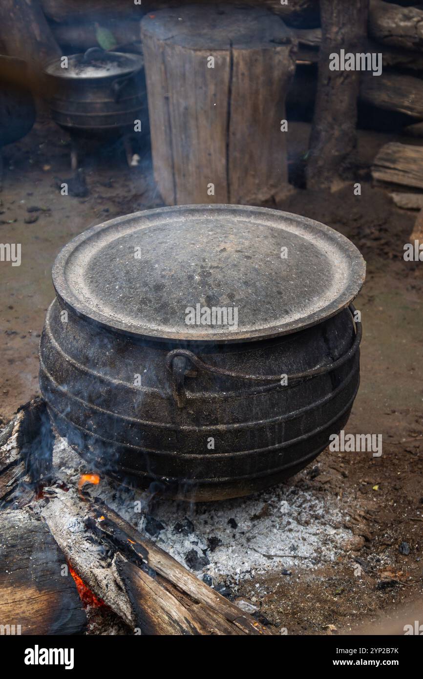 Traditional iron african cooking pot hi-res stock photography and ...