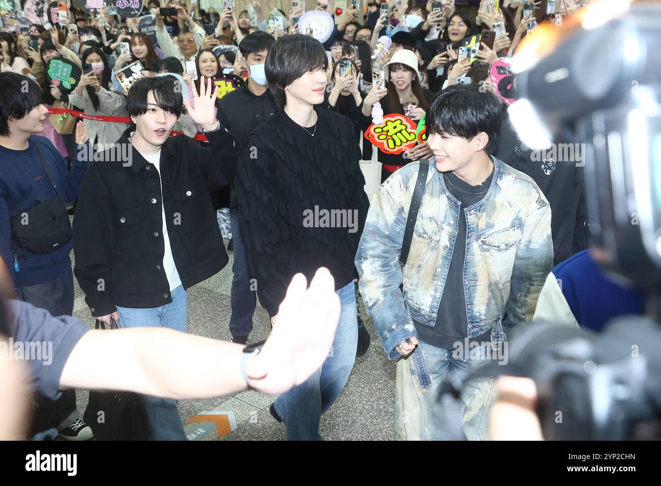 TAIPEI, CHINA - NOVEMBER 28, 2024 - Fans greet Japanese band ...