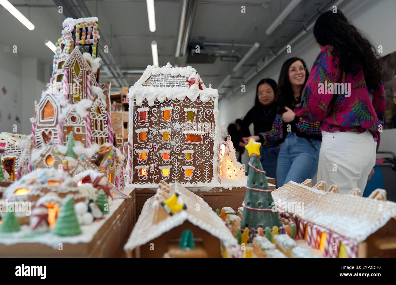 People look at gingerbread models at the Museum of Architecture's ...
