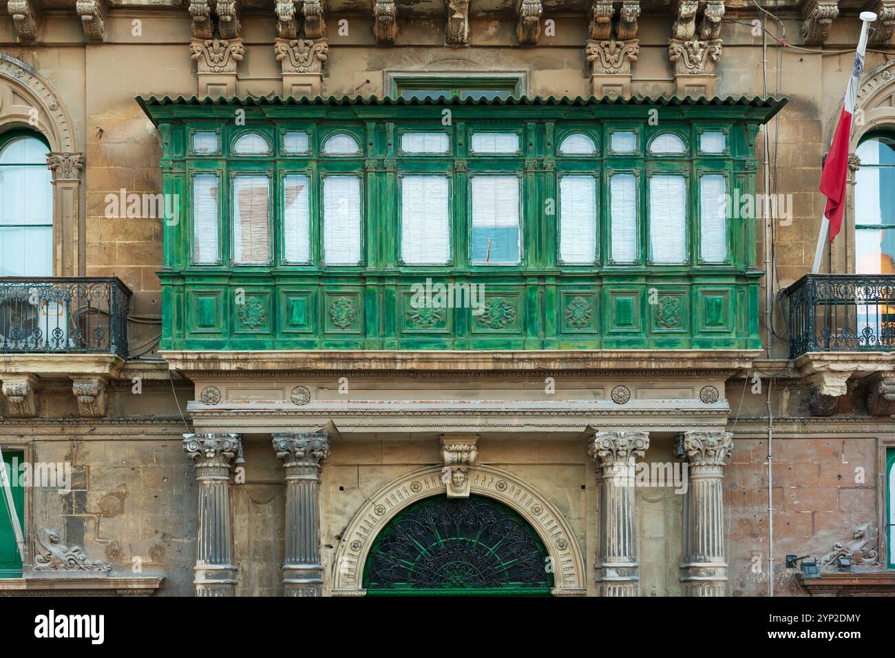 Traditional balcony (gallariji) painted green on historic house in ...