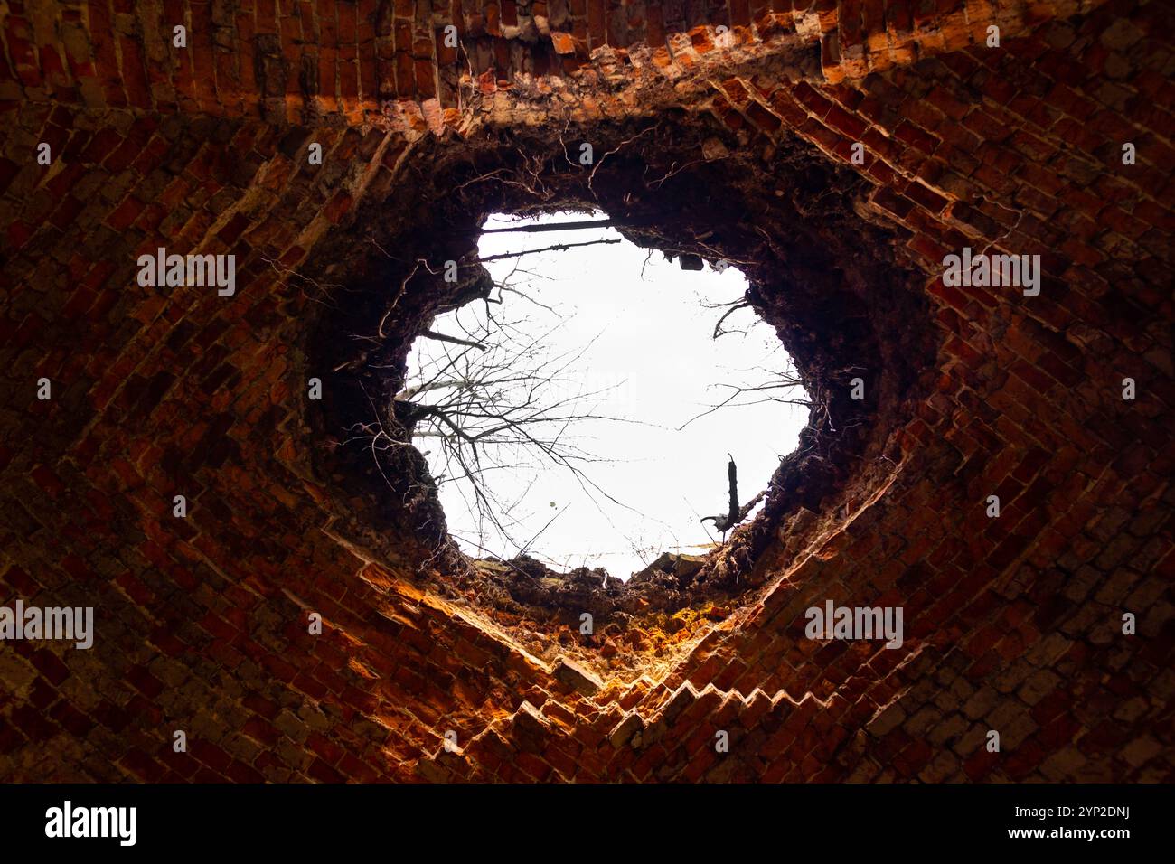 The old ruins of the collapsed walls with gates and windows ...