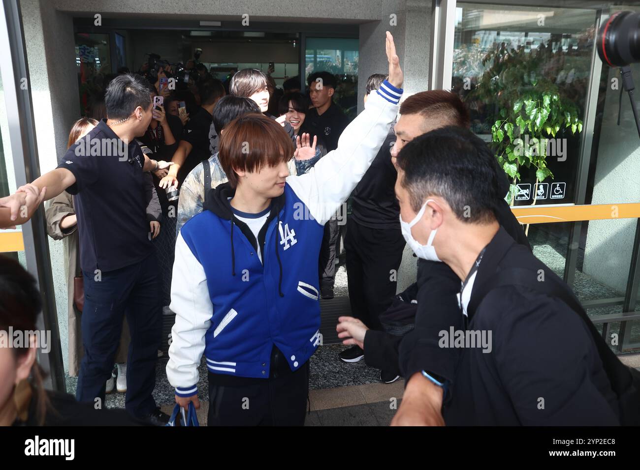 TAIPEI, CHINA - NOVEMBER 28, 2024 - Fans greet Japanese band ...