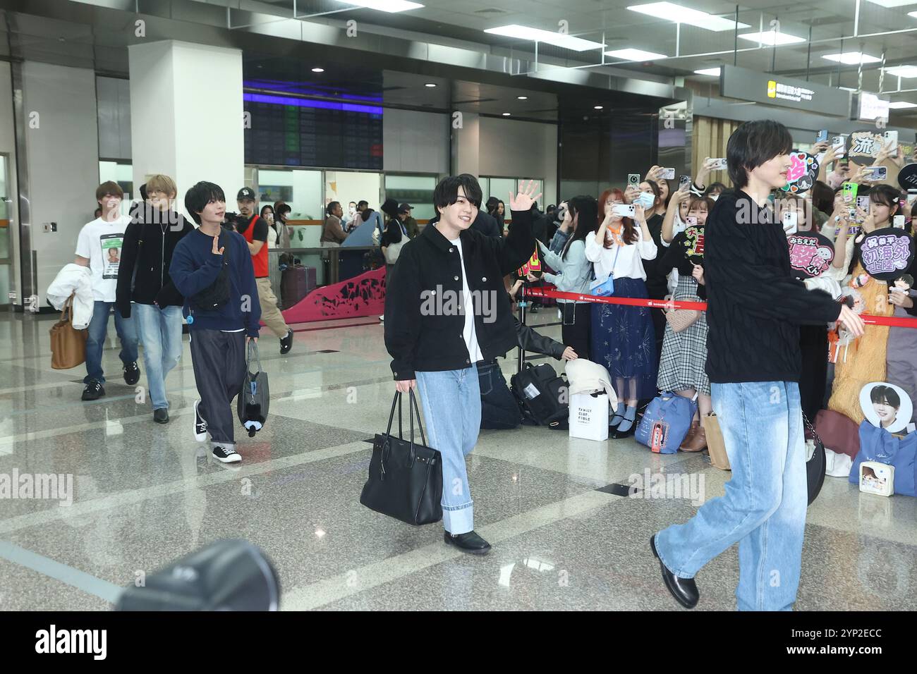 TAIPEI, CHINA - NOVEMBER 28, 2024 - Fans greet Japanese band ...