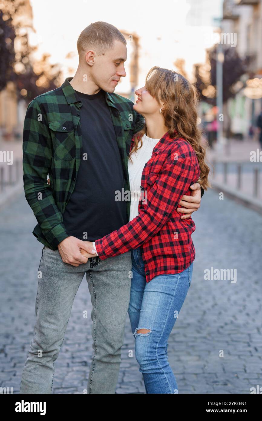 Wear matching shirts hi-res stock photography and images - Alamy