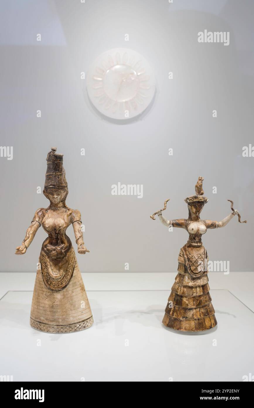 Snake Goddess Crete, two female fertility figurines known as the Snake ...