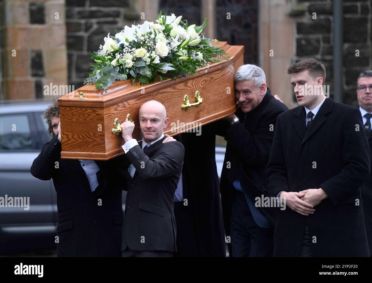 The coffin of veteran journalist and former UTV political editor Ken ...