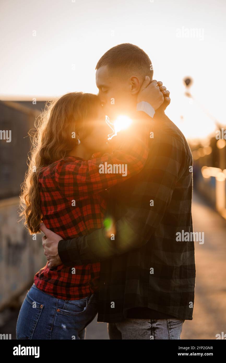 Romantic Sunset Embrace of a Couple Capturing Love and Connection Stock ...