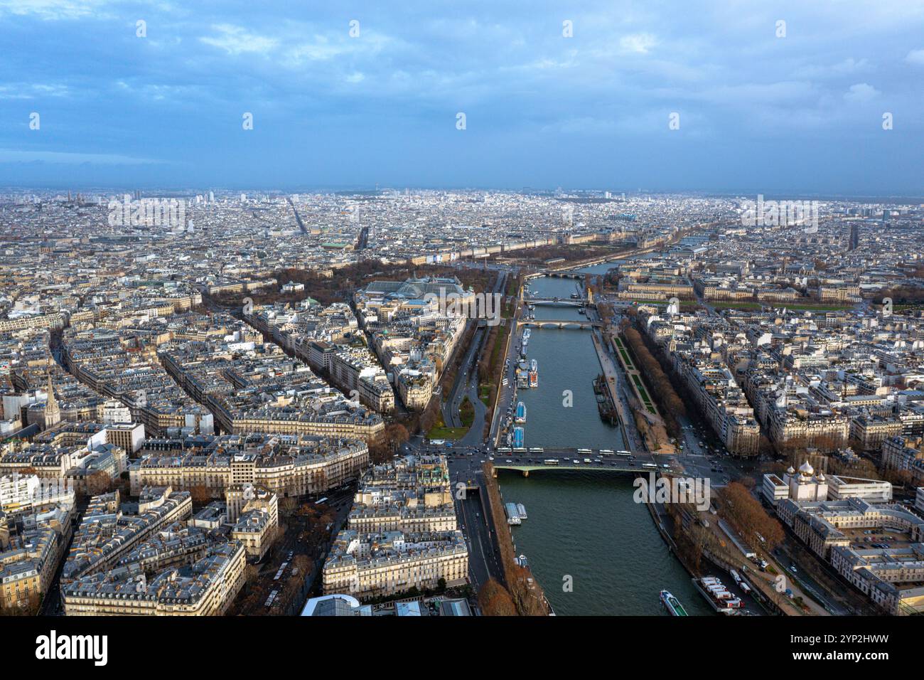 Breathtaking aerial view of Paris, highlighting the Seine River winding ...