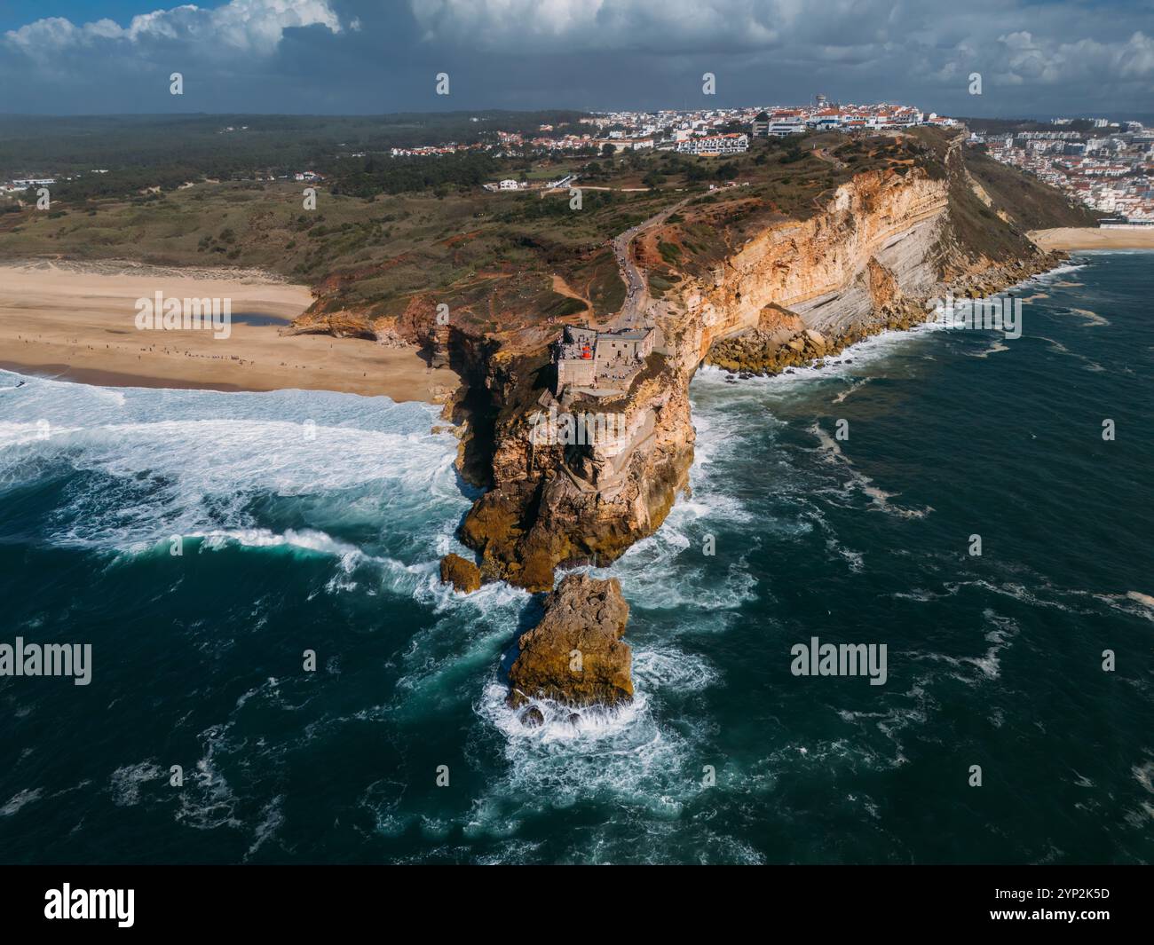 Aerial view of tourists at the historic Sao Miguel Arcanjo lighthouse ...