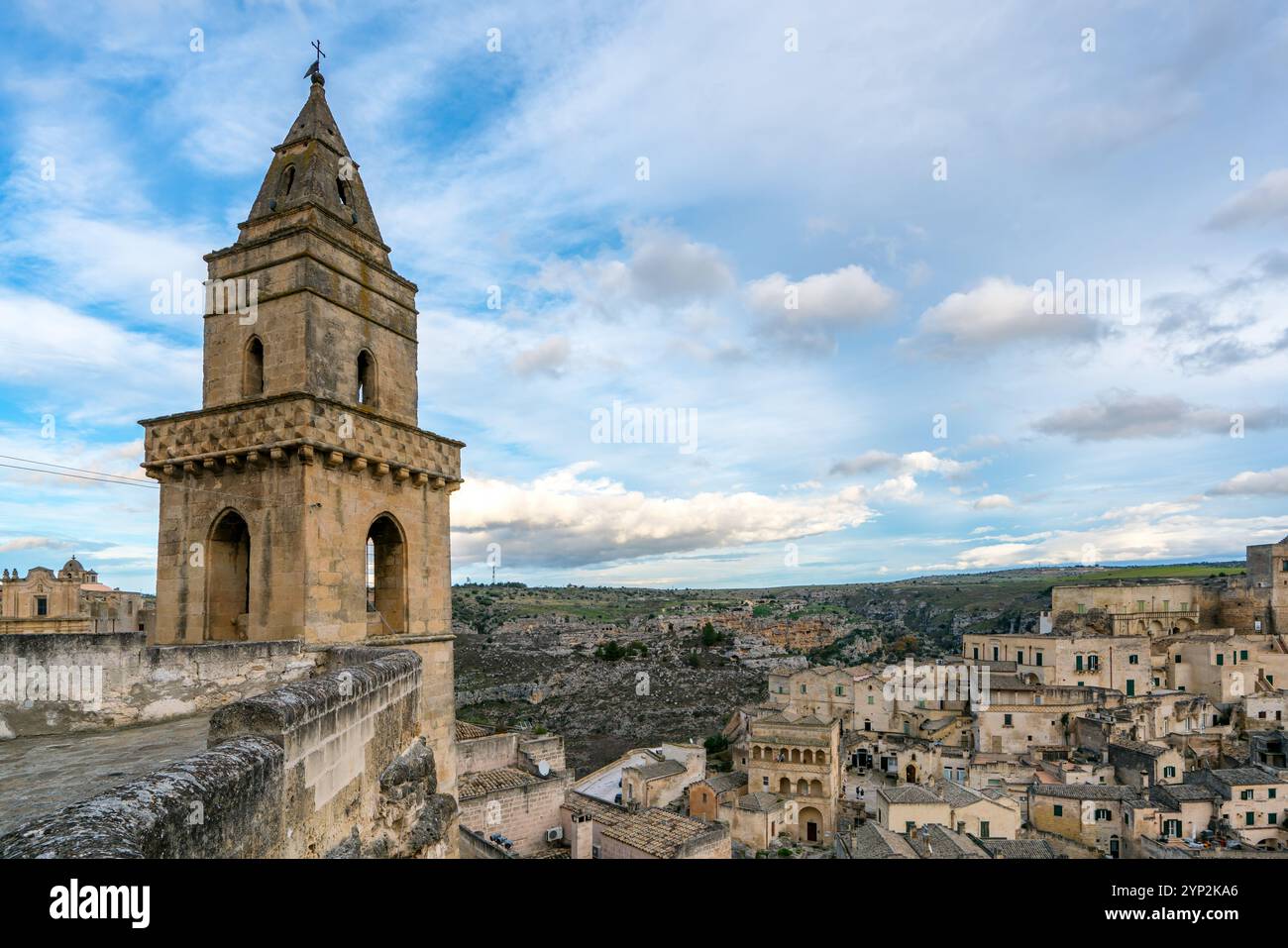 Ancient city view with traditional stone houses and Church of Saint ...