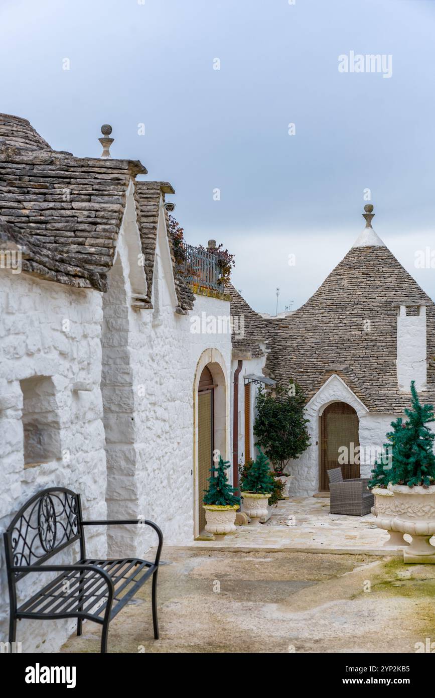 Alberobello iconic old Trullo and Trulli white houses with stone ...