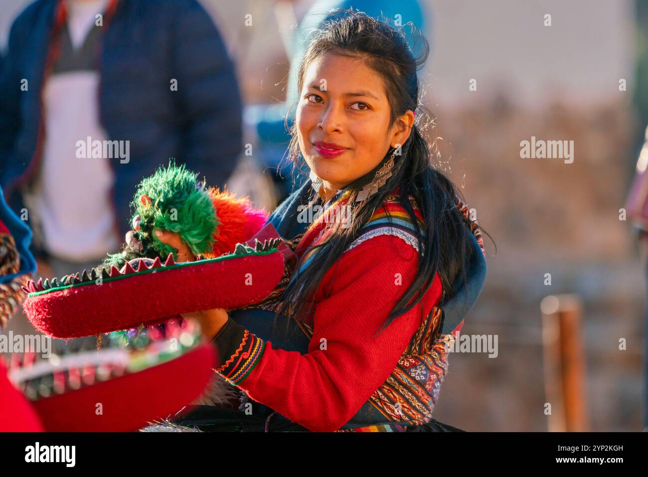Peruvian woman in traditional dress dancing on celebration, Chinchero ...
