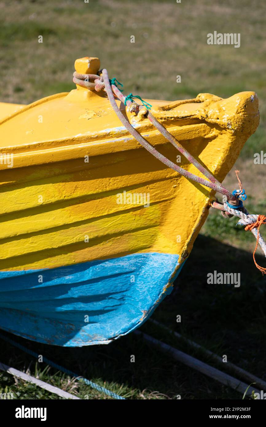 Striking blue and yellow painted boat, Isle of Whithorn, Dumfries and ...