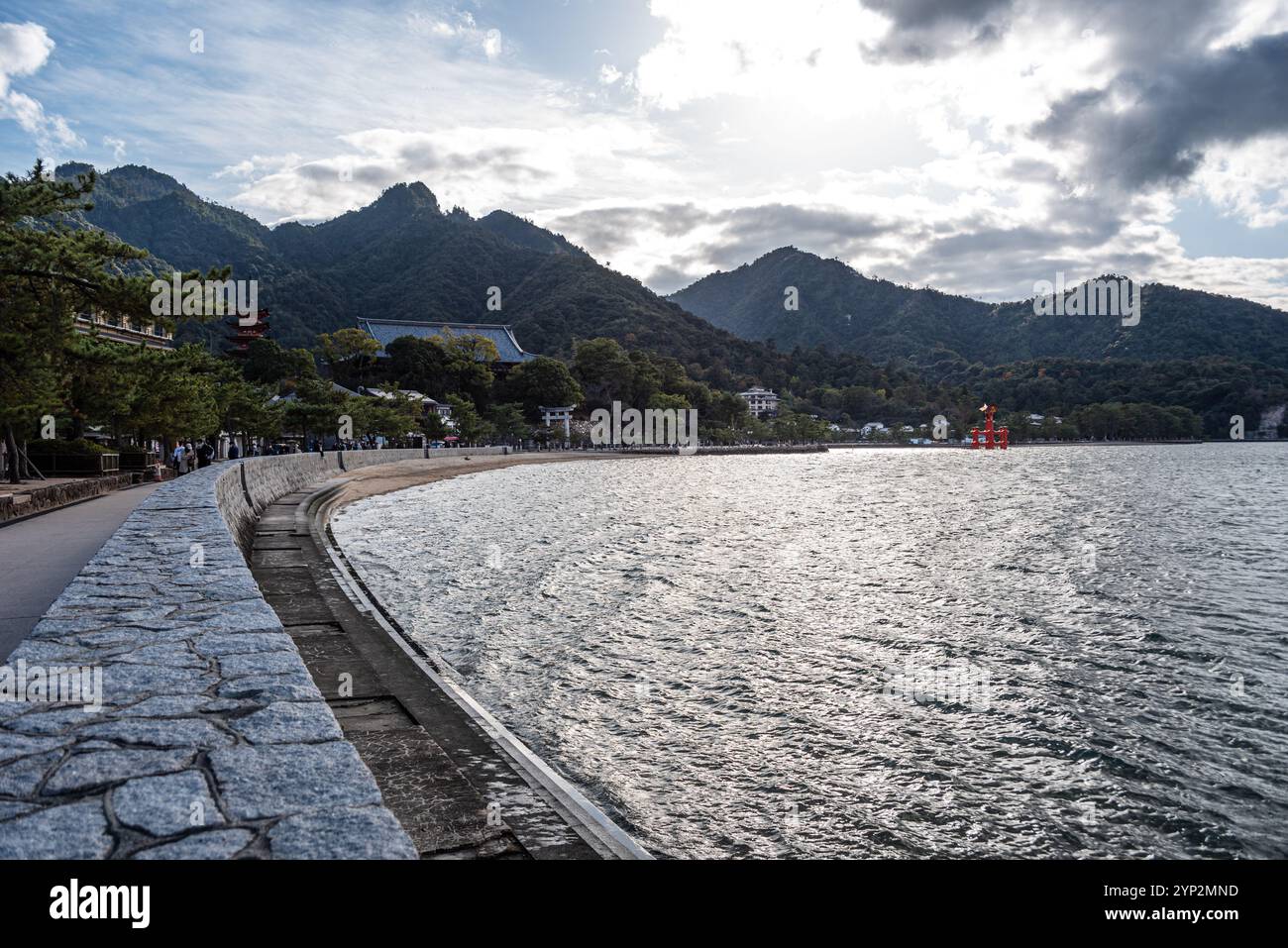 View along the shore line of Miyajima, Itsukushima Shinto Shrine and ...