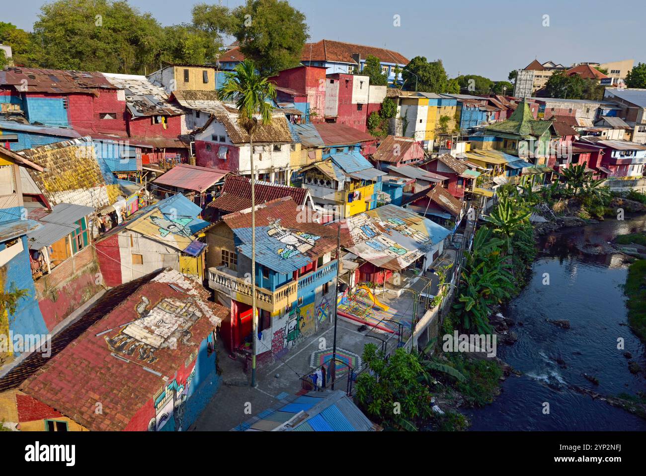 Neighbourhood alongside the Kali Code River, Yogyakarta, Java island ...