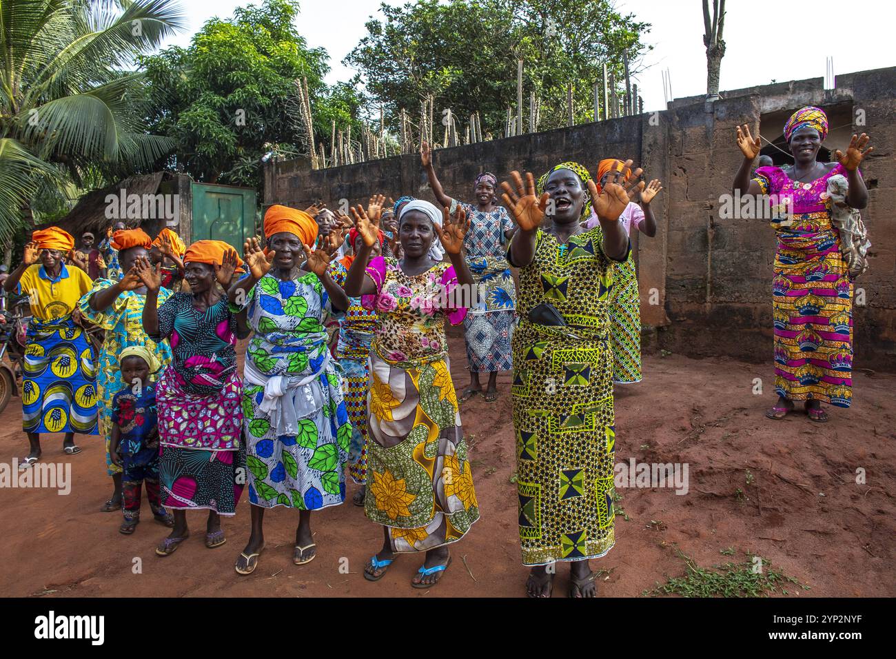 Women's group waving goodbye in Dokoue, Benin, West Africa, Africa ...