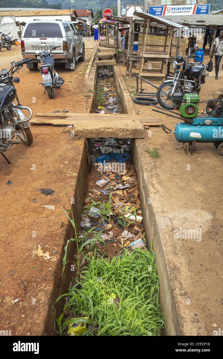 Trash in sewer in Amlame, Togo, West Africa, Africa Stock Photo - Alamy