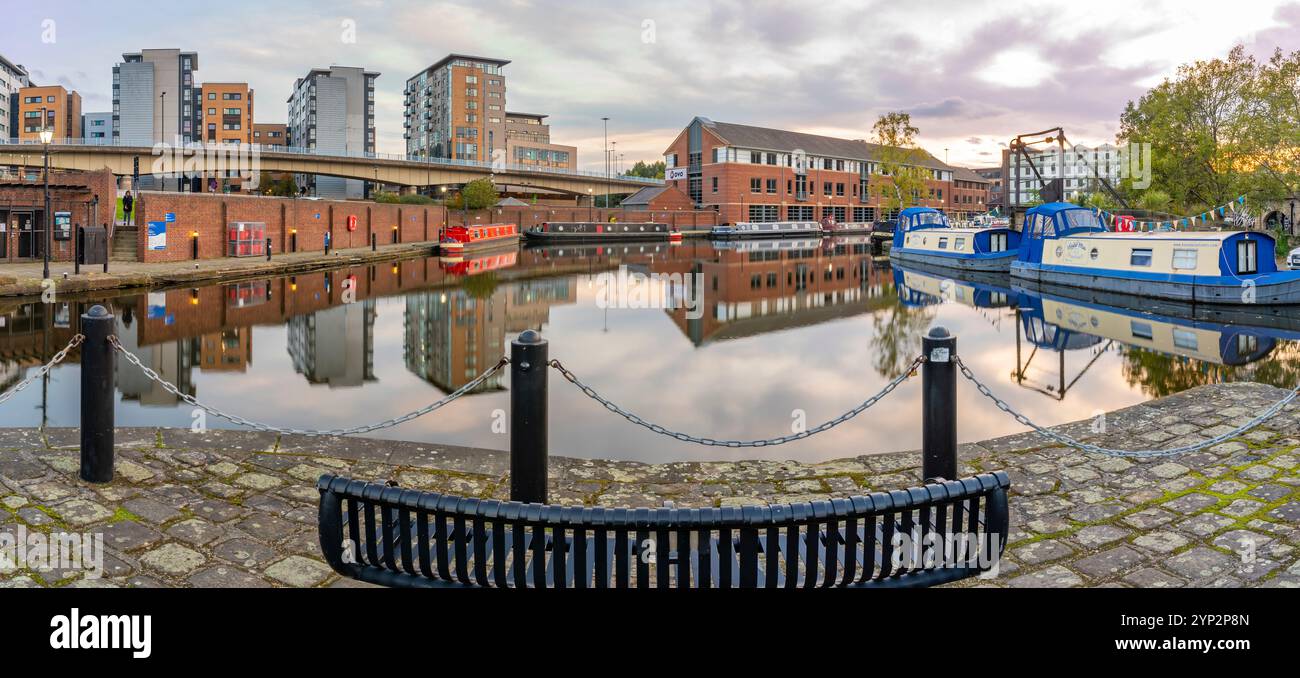 View of canal boats at Victoria Quays at sunset, Sheffield, South ...