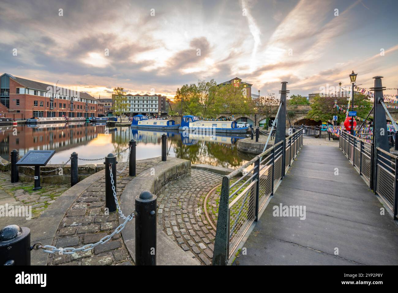 View of canal boats at Victoria Quays at sunset, Sheffield, South ...