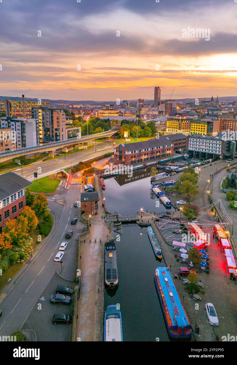 Aerial view of Victoria Quays and Sheffield city skyline at dusk ...