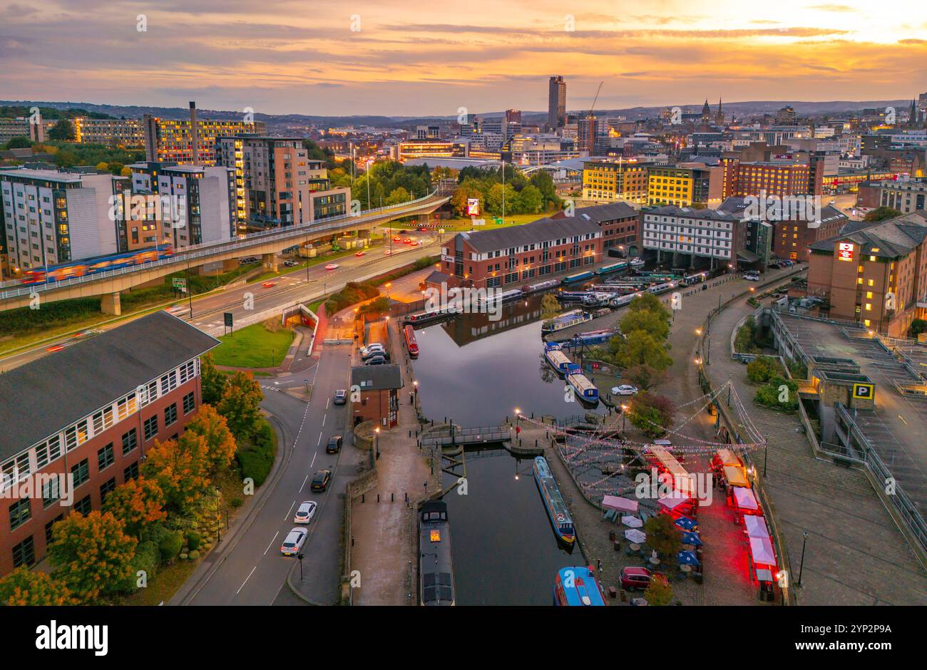 Aerial view of Victoria Quays and Sheffield city skyline at dusk ...