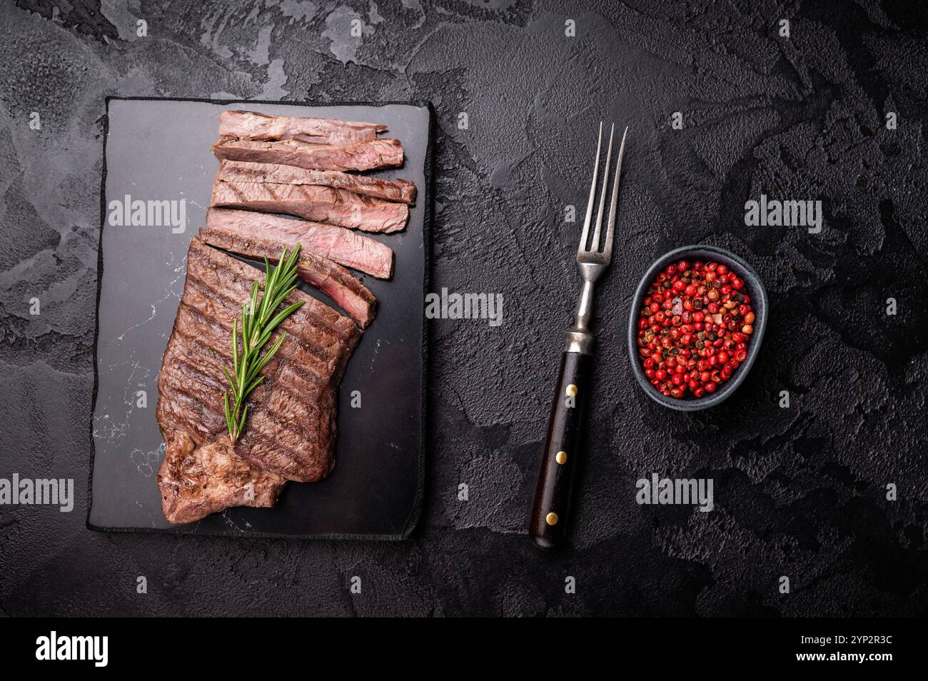 Grilled medium beef Rump steak on marble board. black background. top ...