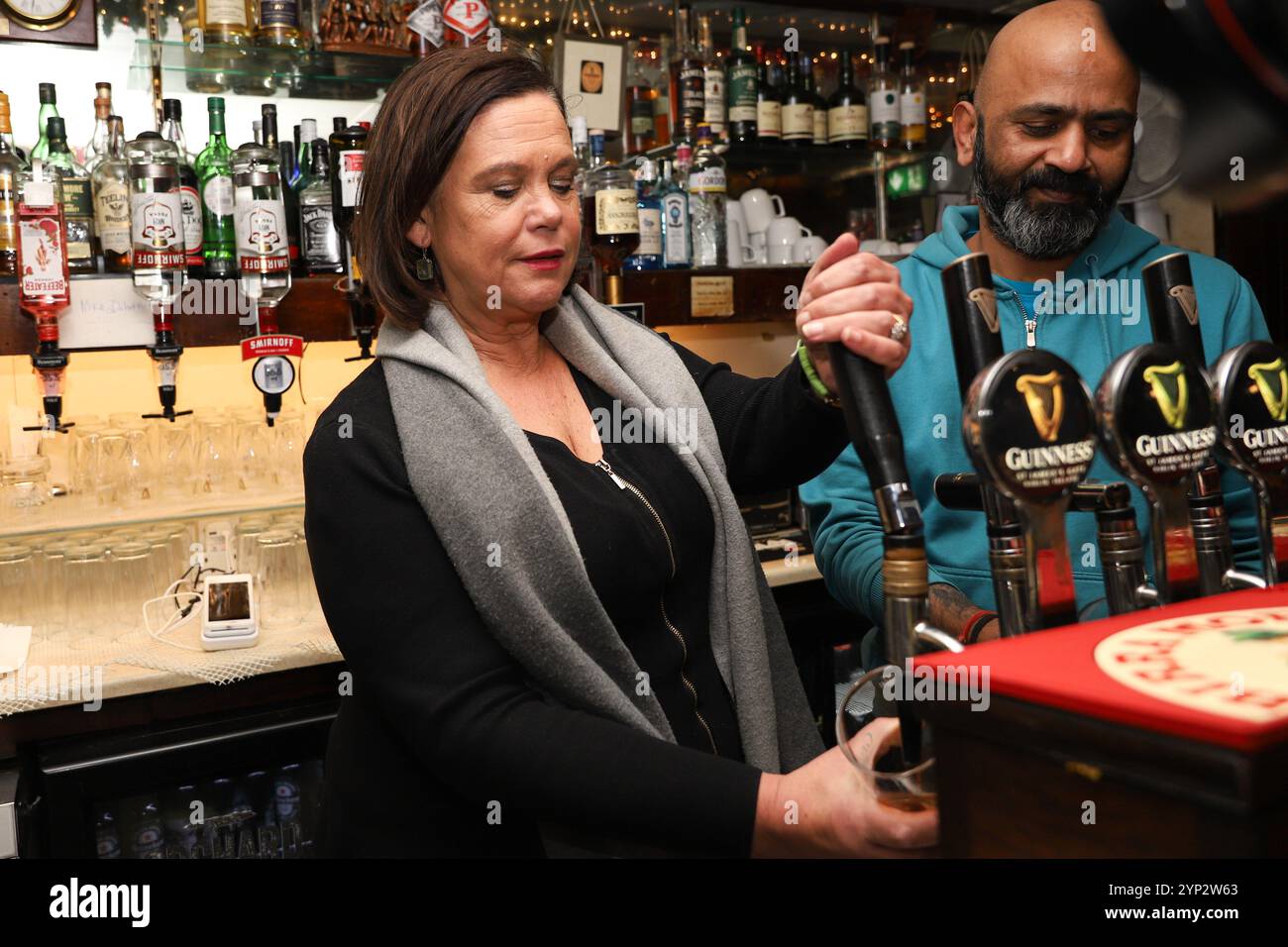 Sinn Fein leader Mary Lou McDonald behind the bar of Grogan’s Pub on ...