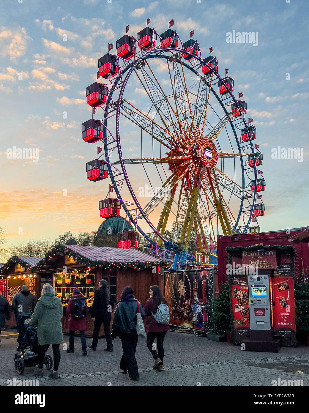 Ferris wheel and market stalls at Christmas market at Red City Hall ...