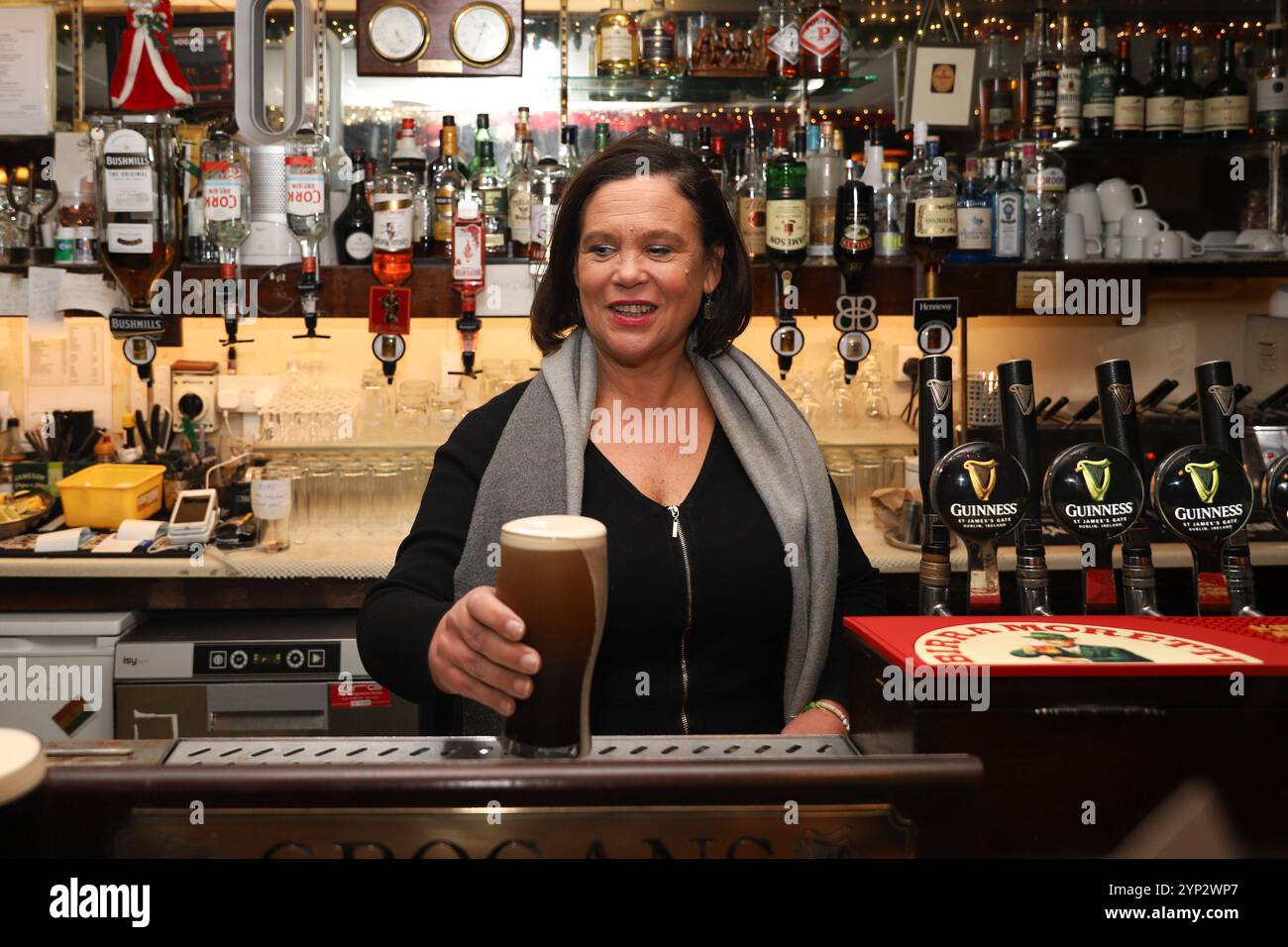 Sinn Fein leader Mary Lou McDonald behind the bar of Grogan’s Pub on ...