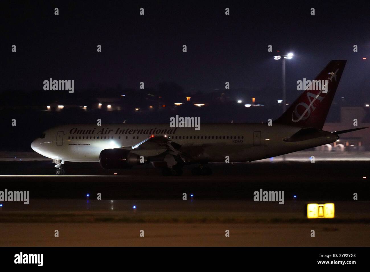 A plane with three American citizens, Mark Swidan, Kai Li and John ...