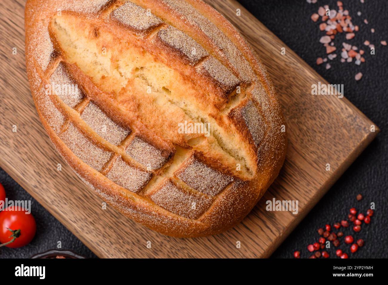 Homemade fresh crispy wholemeal bread on dark concrete background Stock ...