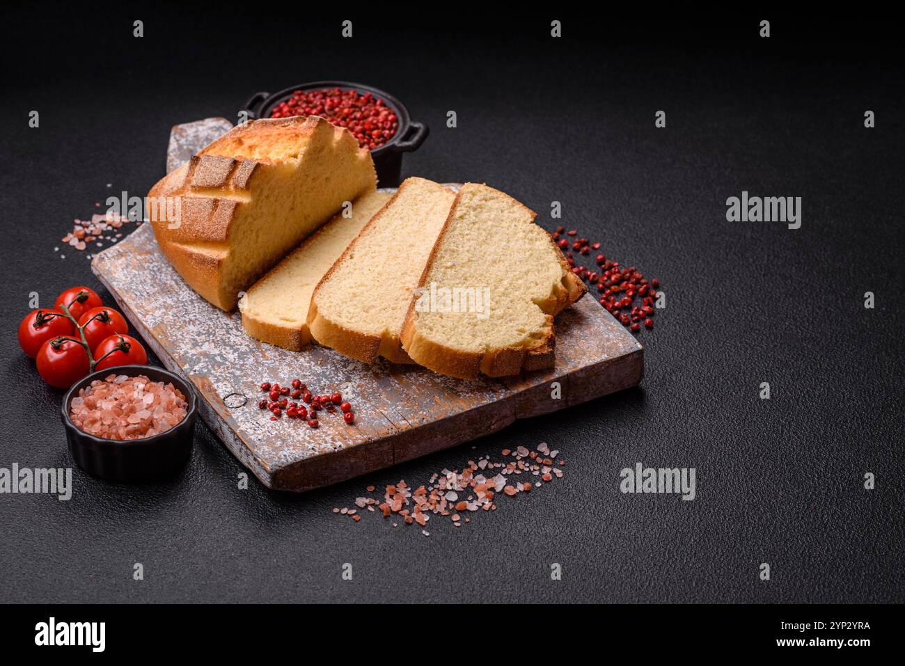 Homemade fresh crispy wholemeal bread on dark concrete background Stock ...