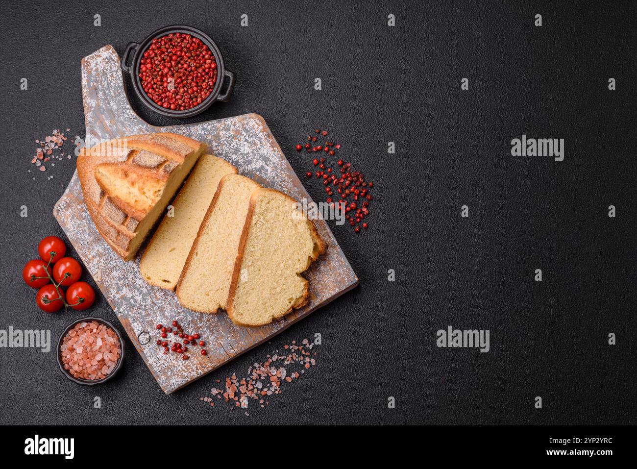 Homemade fresh crispy wholemeal bread on dark concrete background Stock ...