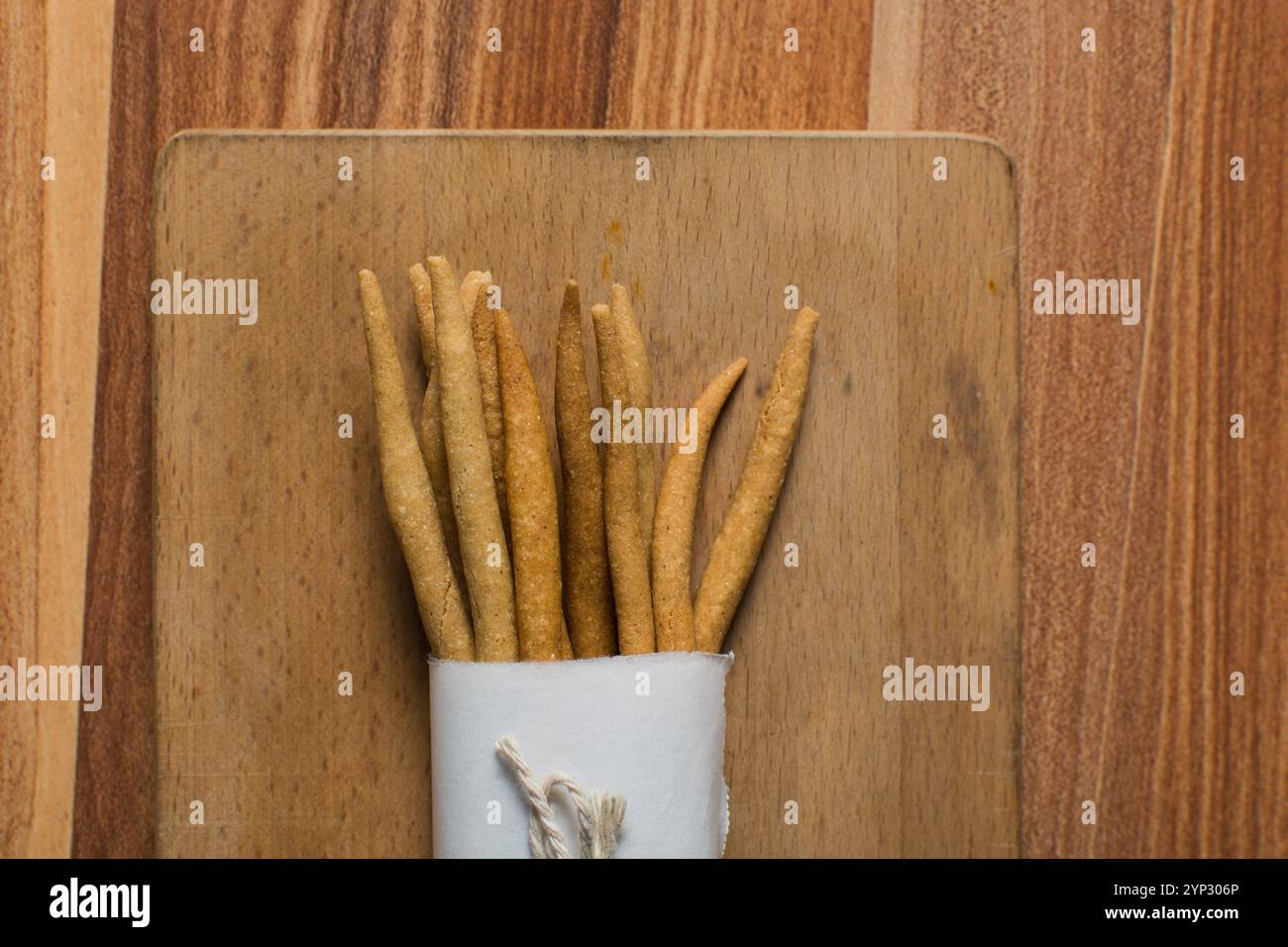 Top view of fried corn stick snack on a wood board, Overhead view of ...