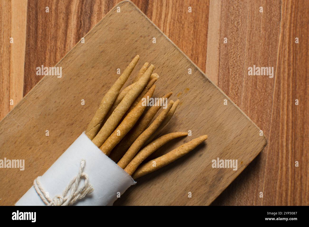 Top view of fried corn stick snack on a wood board, Overhead view of ...