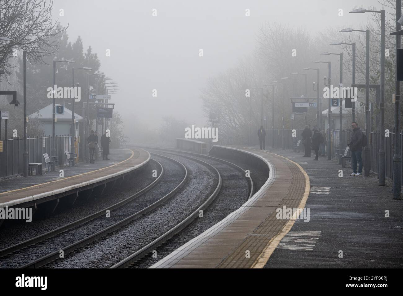 Warwick Parkway railway station in foggy, frosty weather, Warwickshire ...