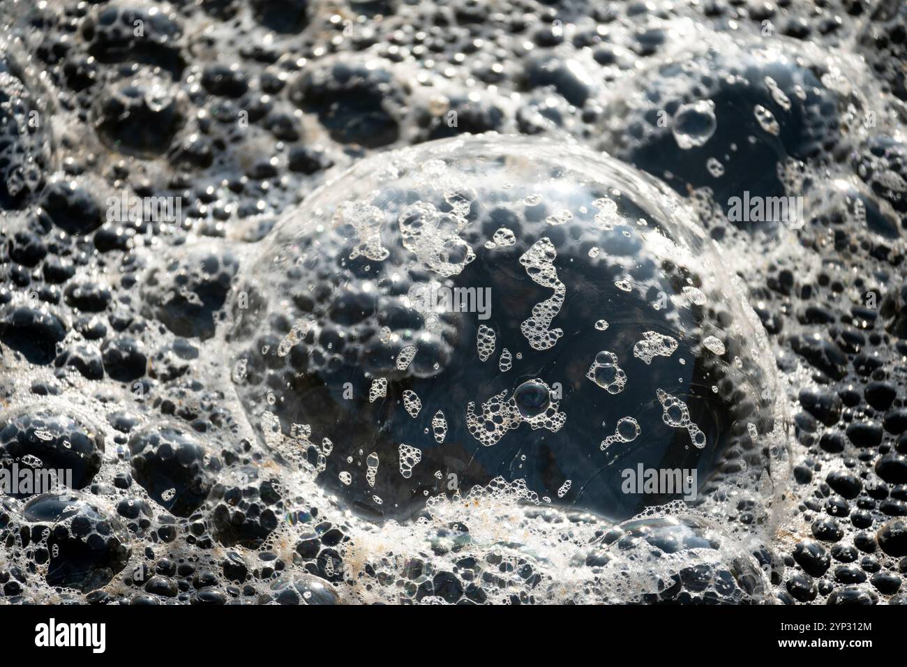 A bubble on frothy water, Grand Union Canal, Warwickshire, UK Stock ...