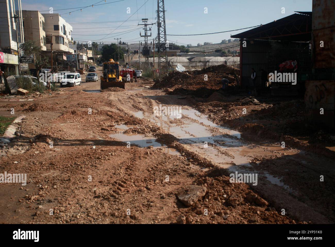 A view of the destruction caused by an Israeli airstrike on the Fara a ...