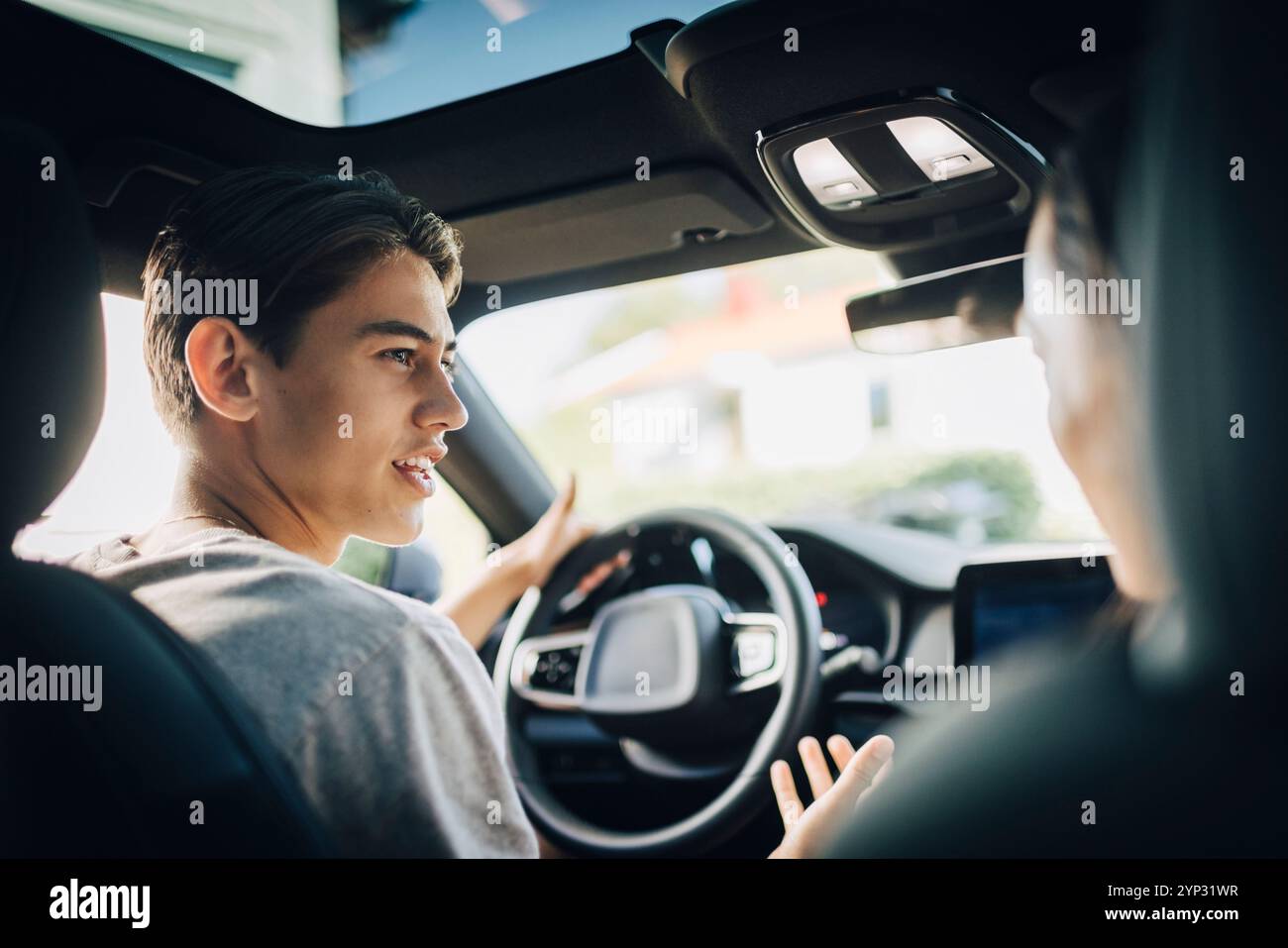 Indian man driving car in hi-res stock photography and images - Alamy