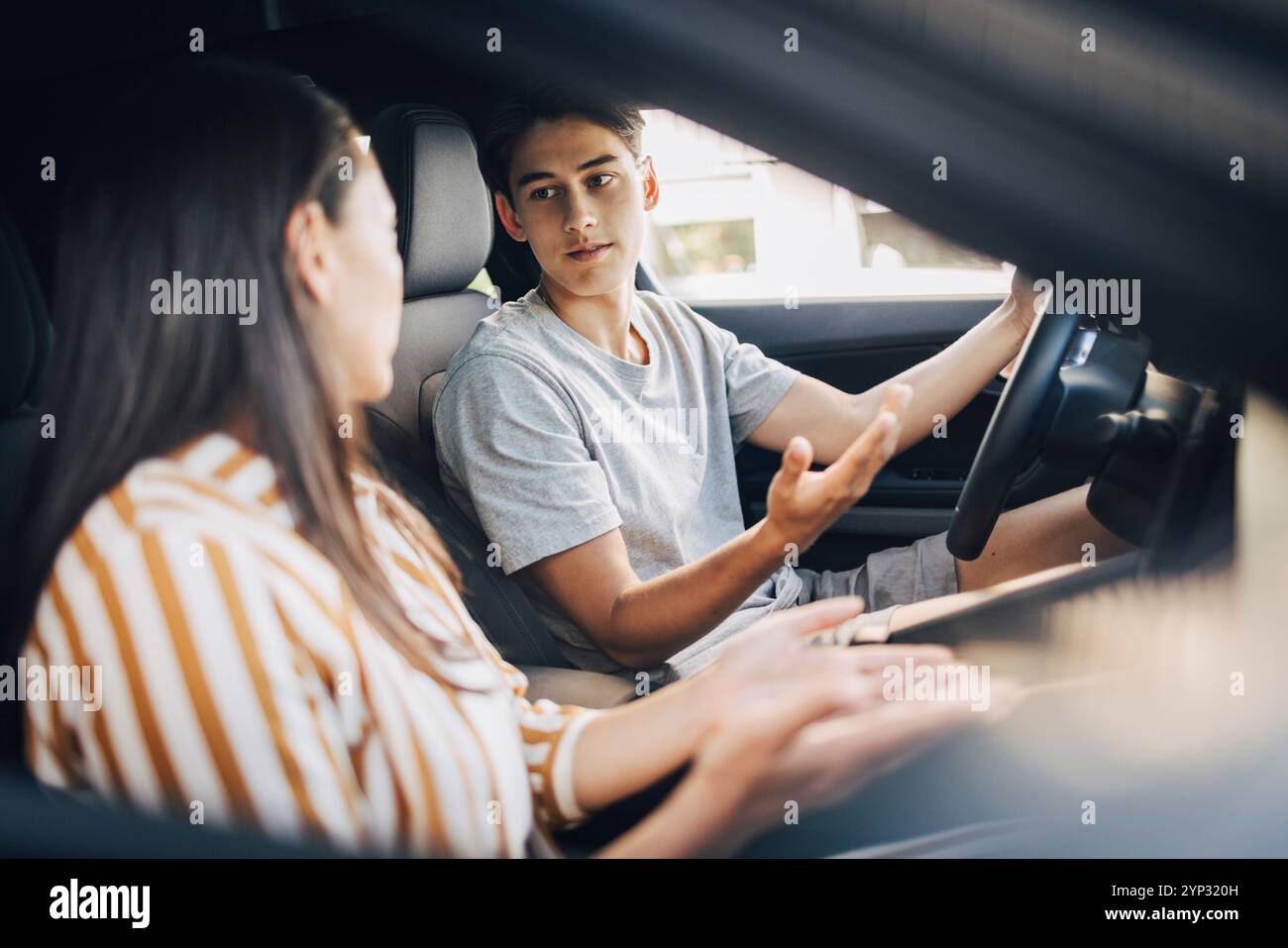 Indian man driving car in hi-res stock photography and images - Alamy