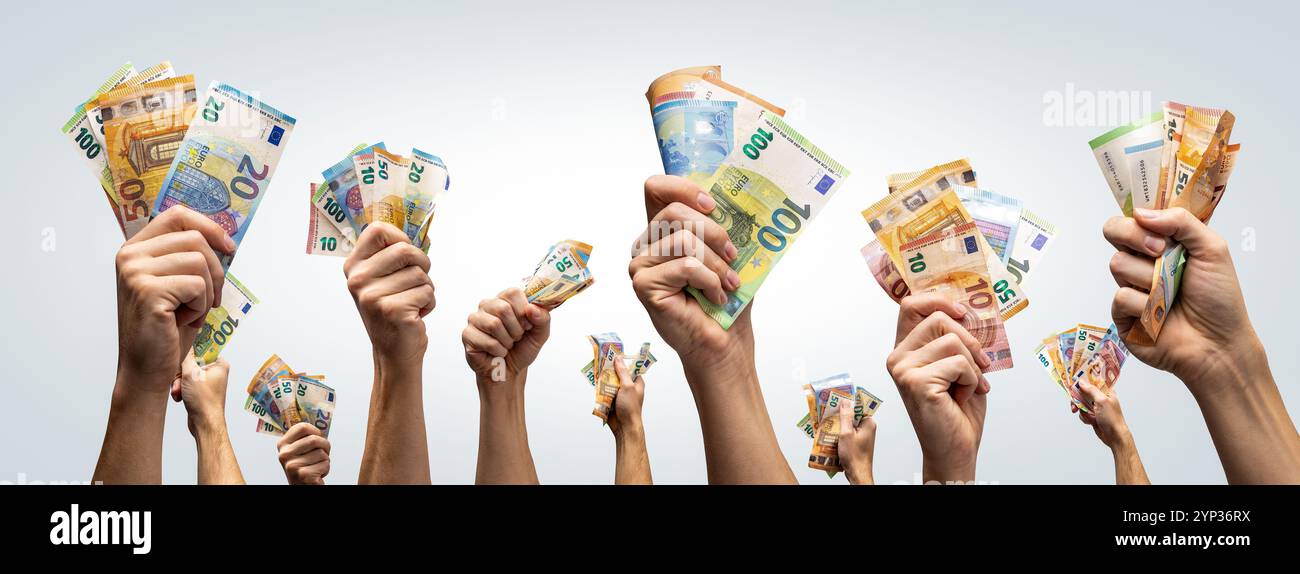 Many hands holding Euro banknotes up in the air Stock Photo - Alamy