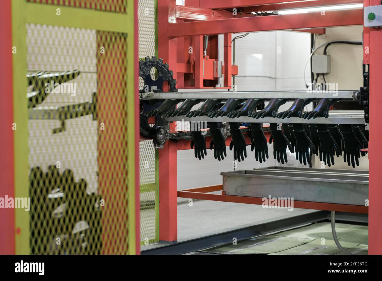 Nitrile glove manufacturing hi-res stock photography and images - Alamy