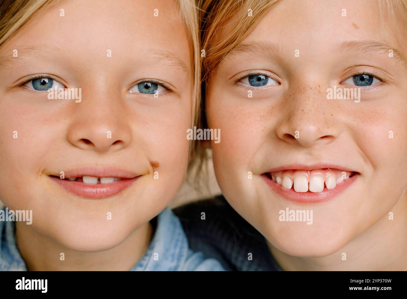 Portrait of smiling brothers with blond hair and blue eyes Stock Photo ...
